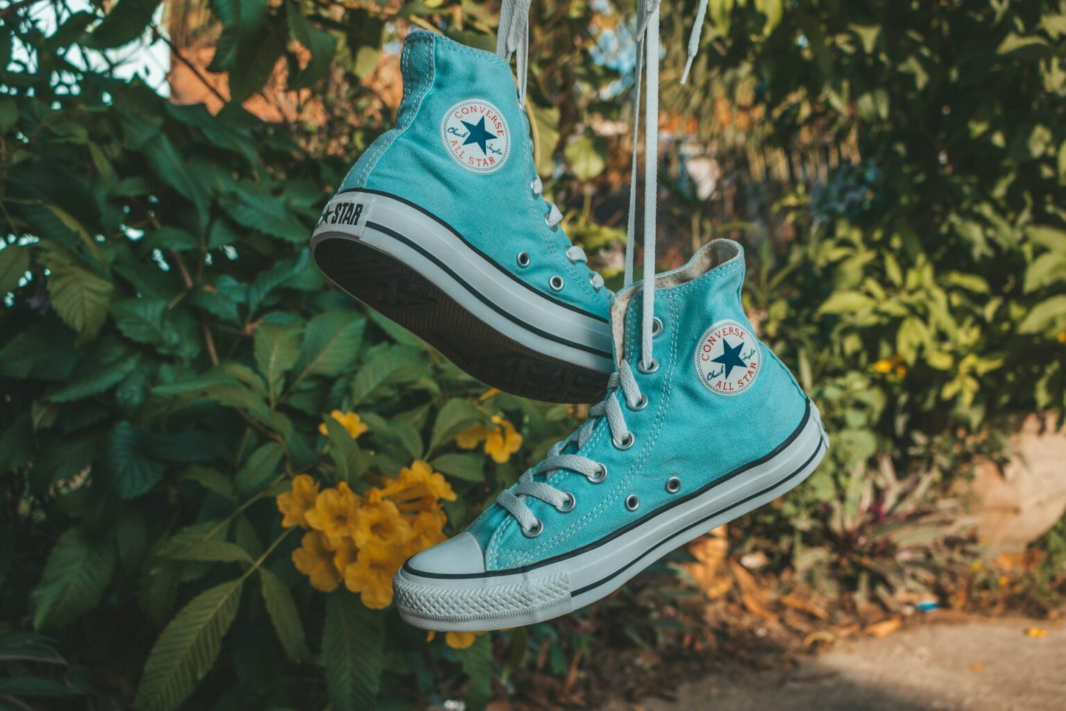 The History of Converse: 17 Facts About All Star Sneakers - Fashion ...